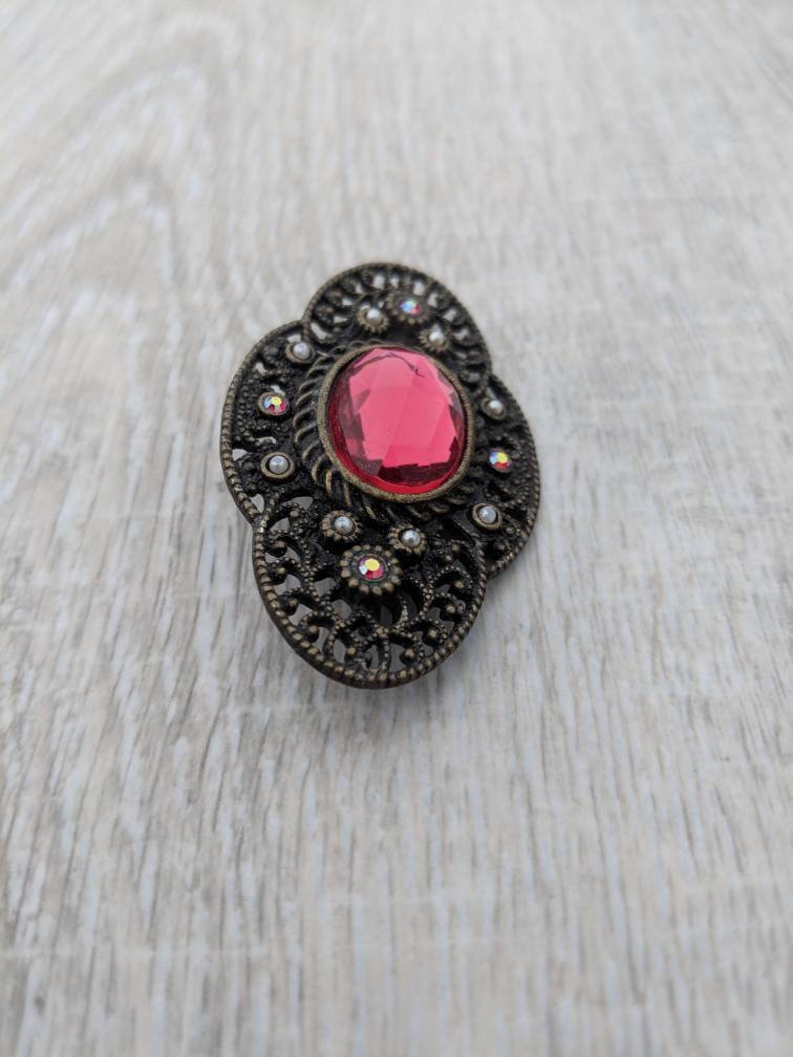 Antiqued Filigree Shield With Faceted Pink Rhinestone Center - Etsy