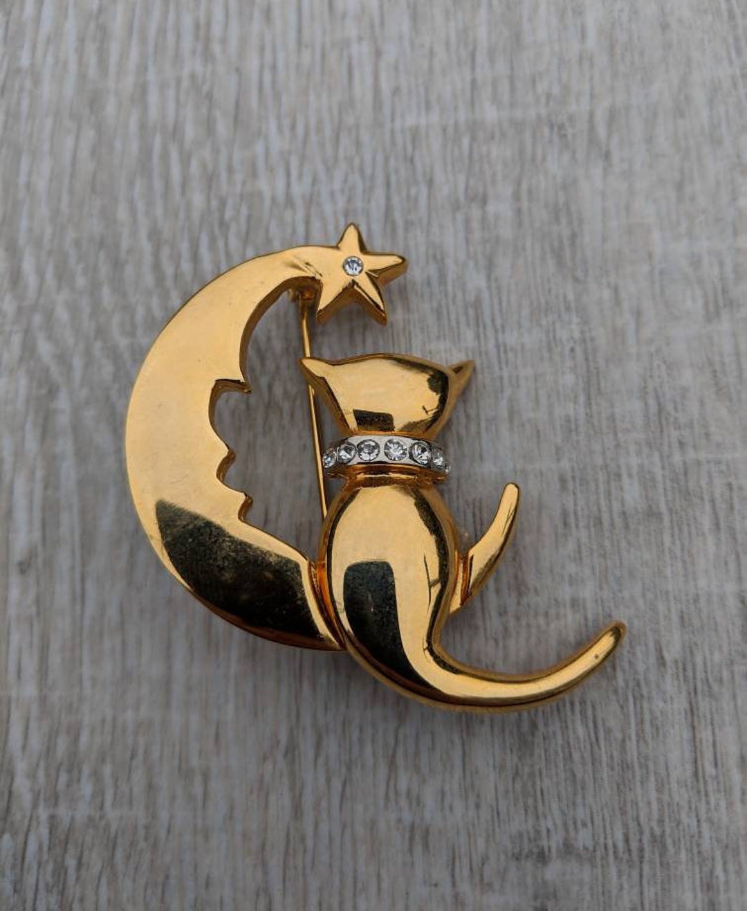 Gold Tone Cat With Rhinestone Collar Sitting on a Crescent Moon Brooch ...