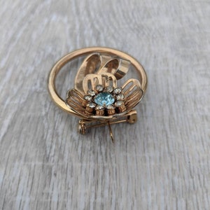 Bright Blue Rhinestone and Gold Tone Flower and Ribbon Circle Brooch or ...