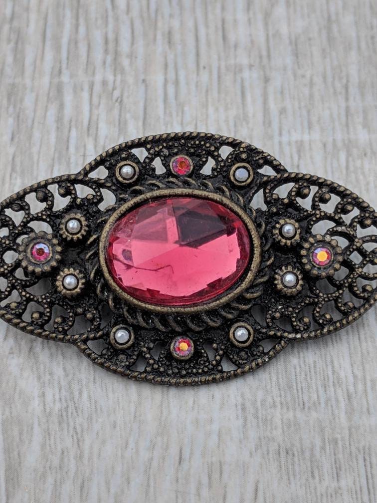 Antiqued Filigree Shield With Faceted Pink Rhinestone Center - Etsy