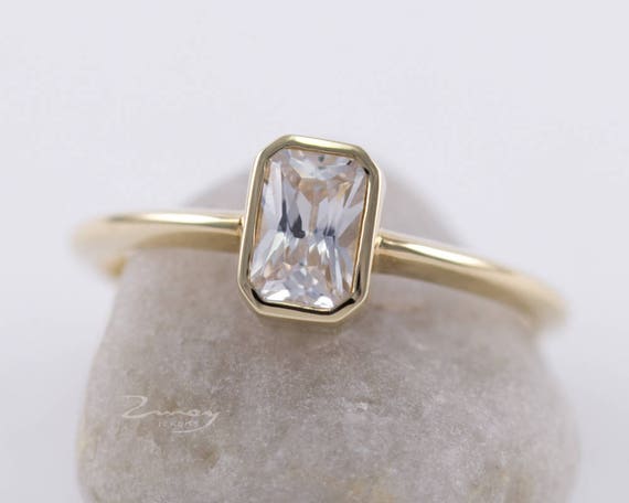 Simple Emerald Cut Engagement Rings