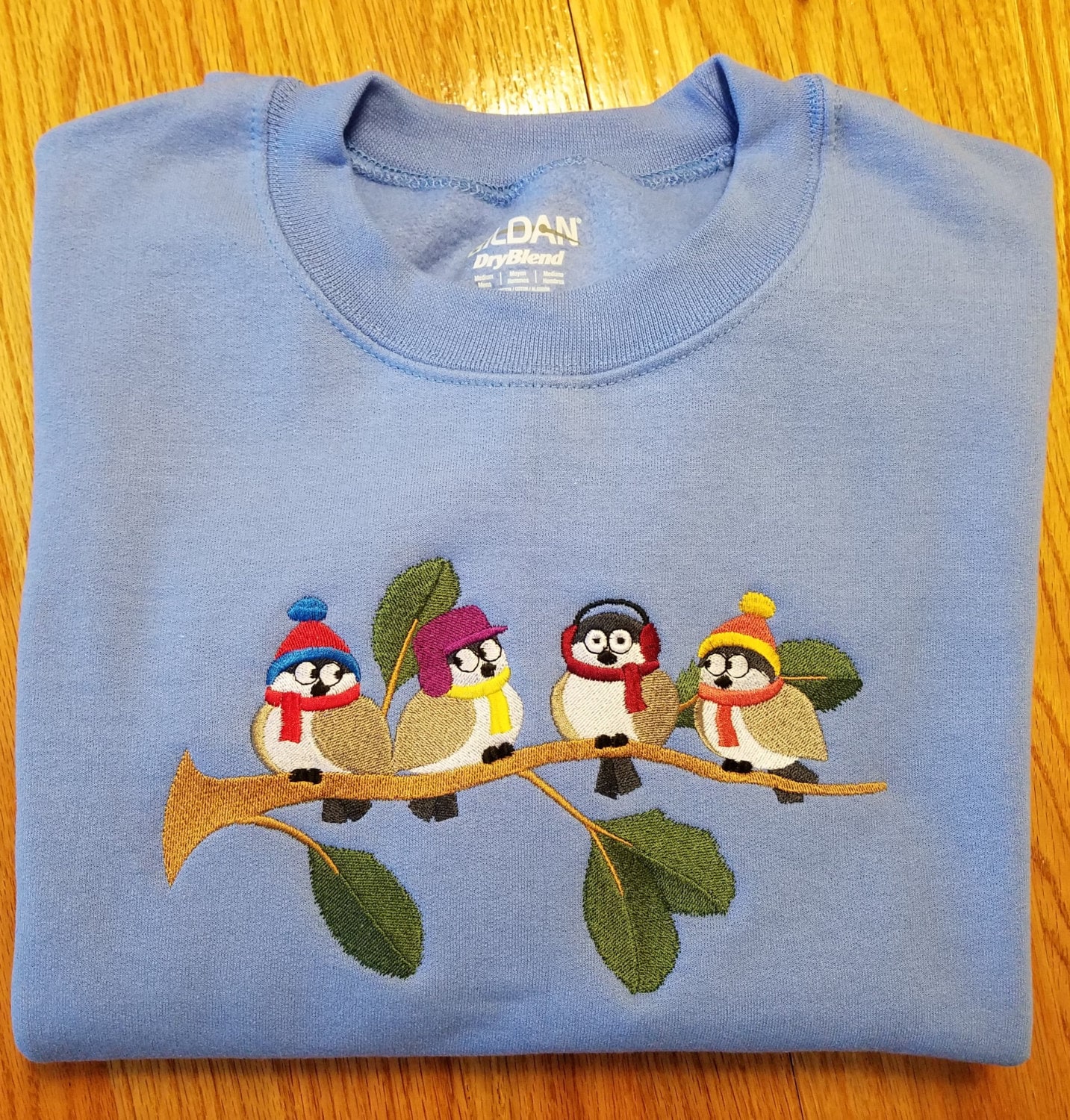 Embroidered Chickadees Dressed for Winter Light Blue UNISEX Sweatshirt ...