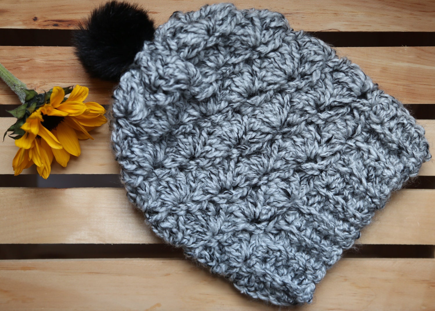 Gray speckled shell hat with faux fur pom ready to ship