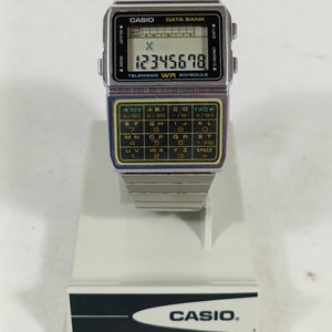 Casio DBC-610 With WR Symbol Calculator Data Bank Watch Module 676 ...