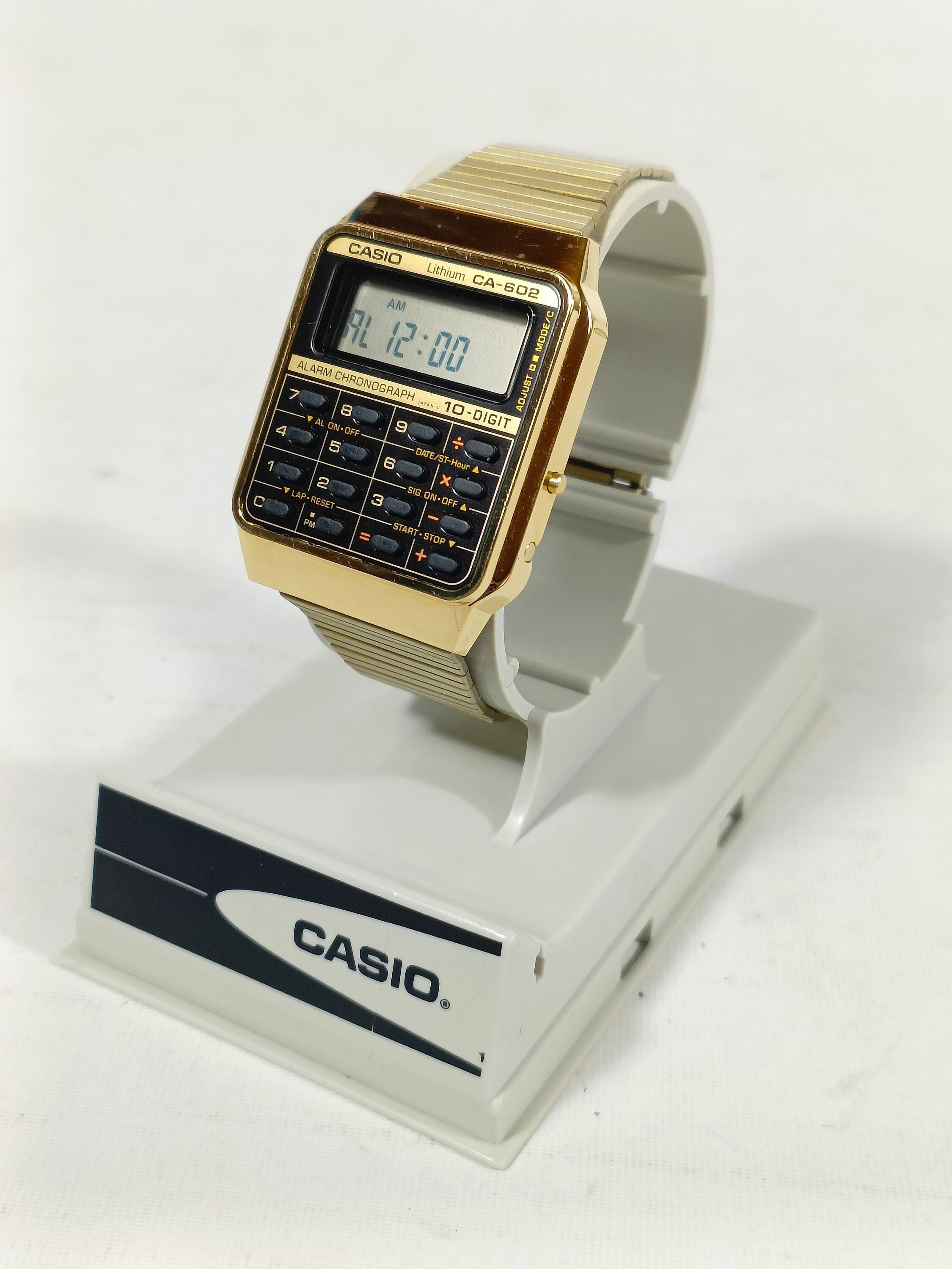 Gold Calculator Watch