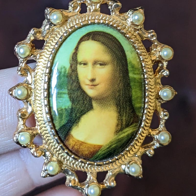 Vintage Mona Lisa Brooch - Etsy