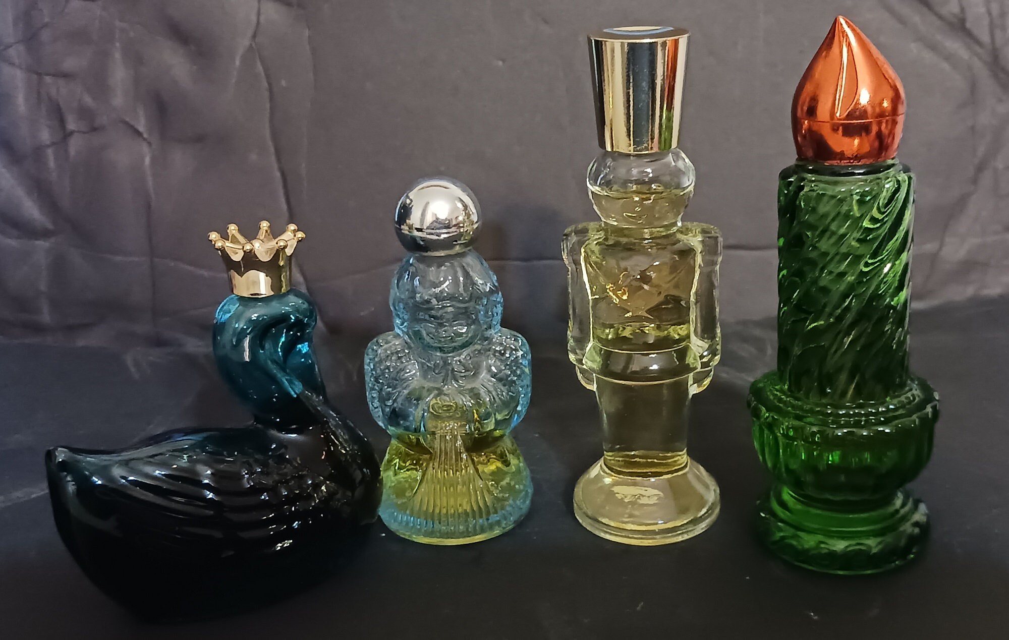 Vintage Avon Perfumes. Four Different Bottles. Christmas Candle ...