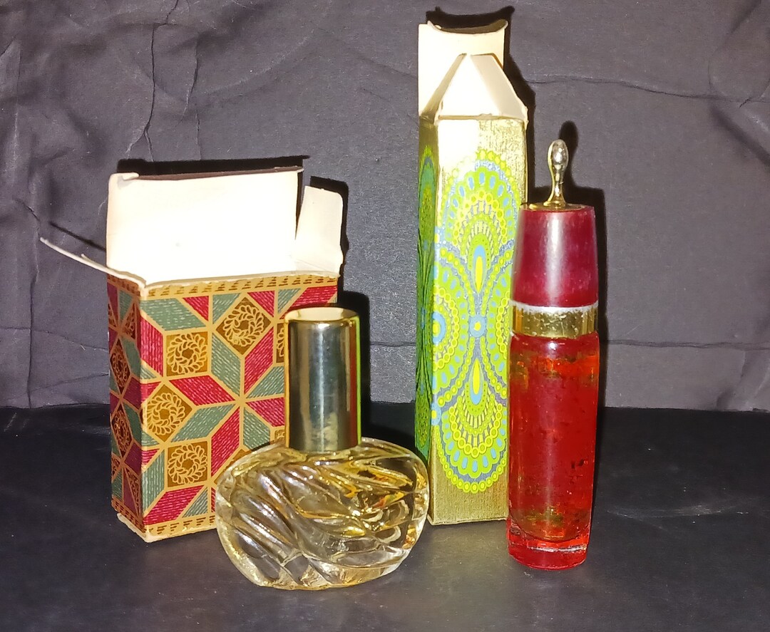 Vintage Avon Perfumes. One is "charisma" .33oz and One is "foxfire ...