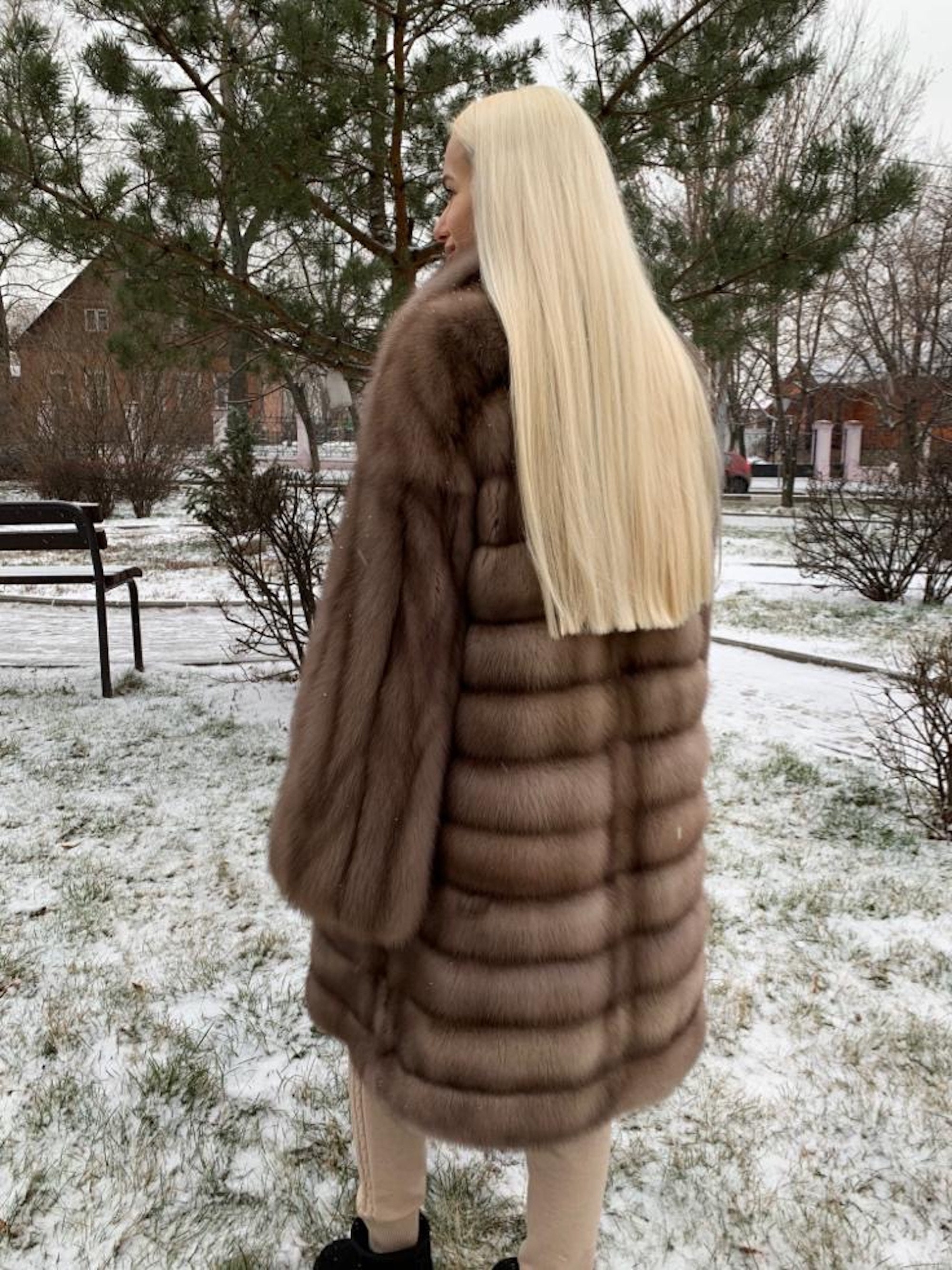 Long stylish marten fur coat