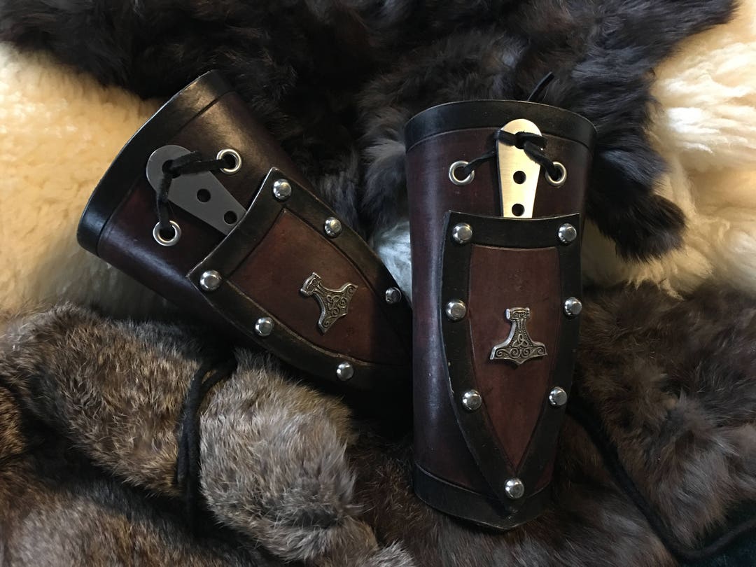 Leather Bracers With Mjolnir Concho and Custom Dagger Holder Insets - Etsy