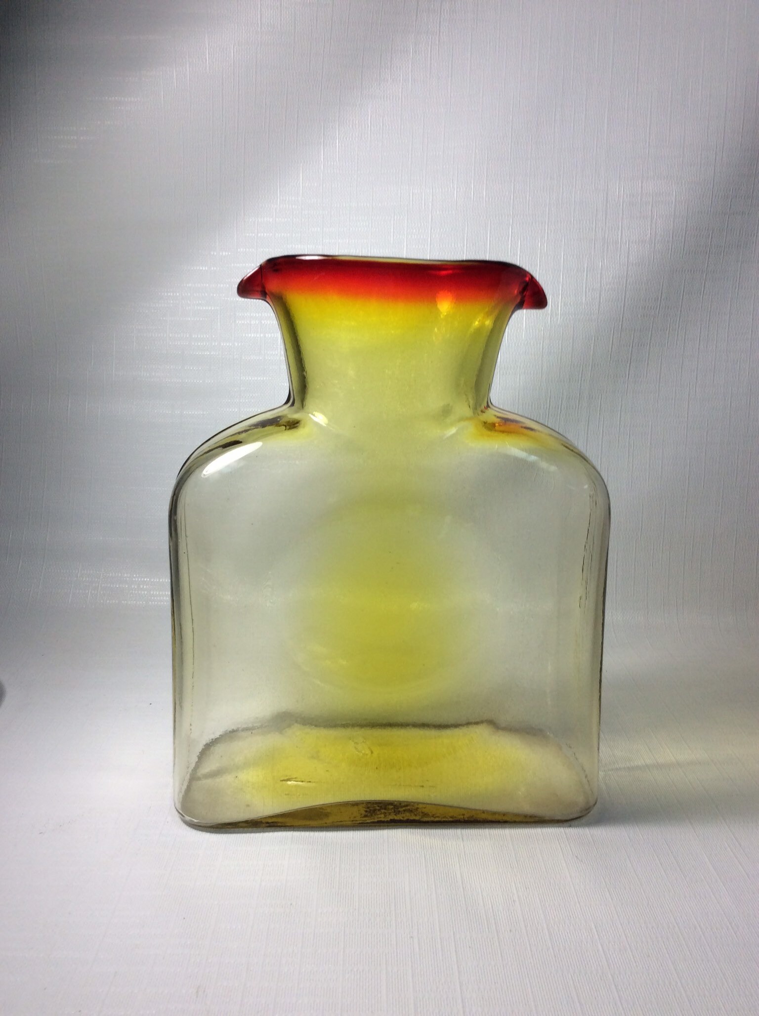 Blenko Glass vintage water bottle 384 in tangerine Amberina