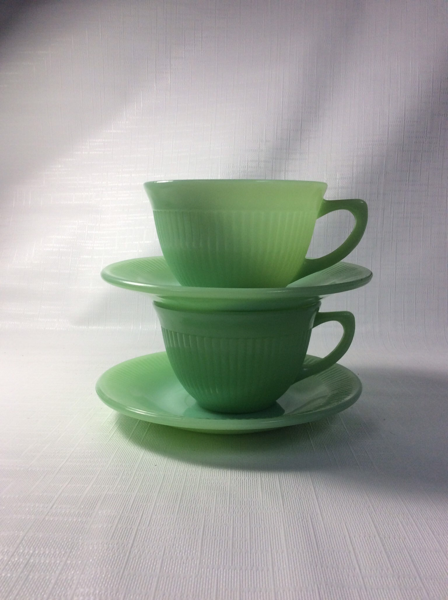 Two Jadeite coffe or tea cup and saucer. Fire King Oven Glass, Jane Ray ...