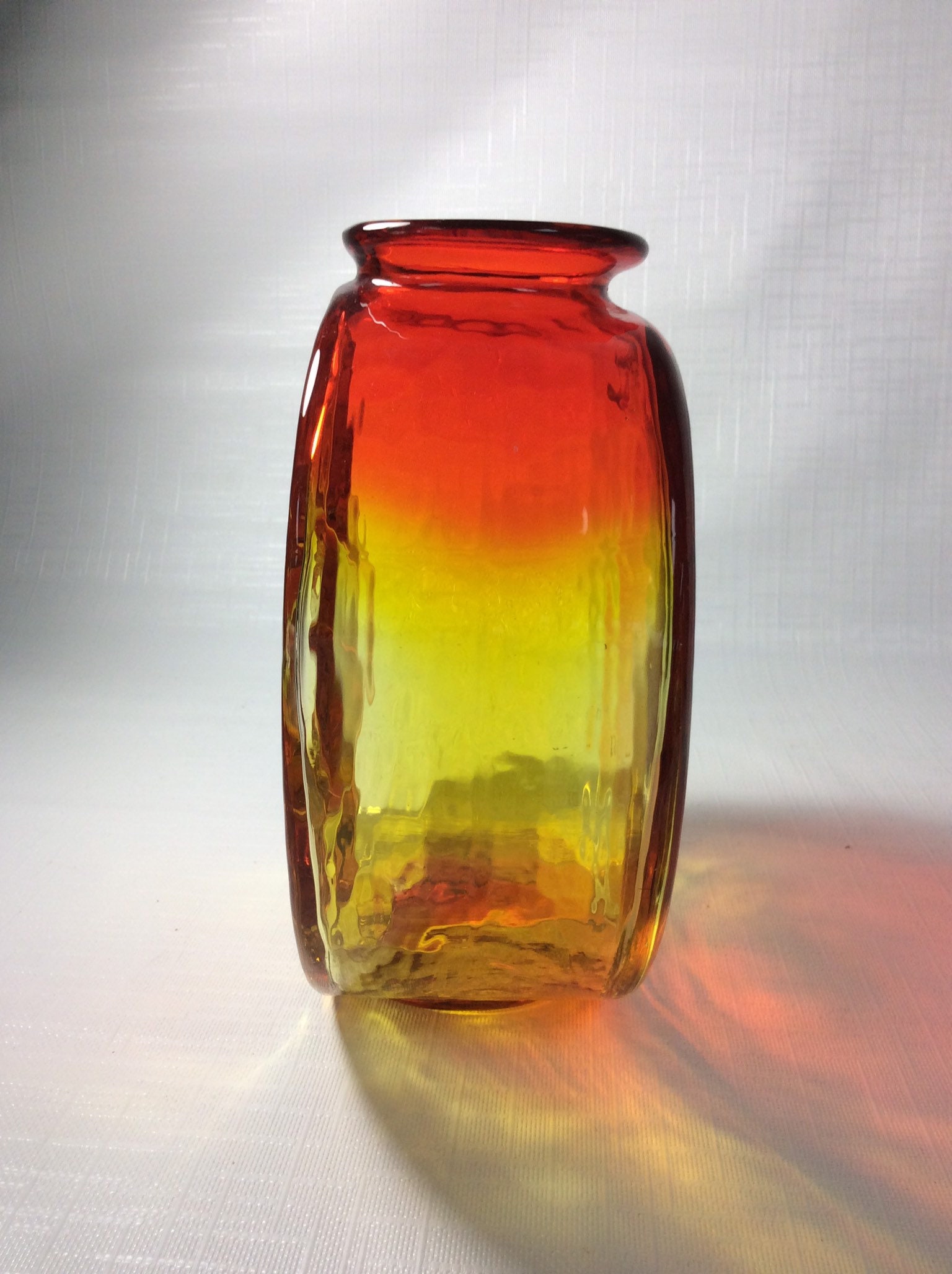 Blenko Glass 6322 tangerine clover vase. Husted design