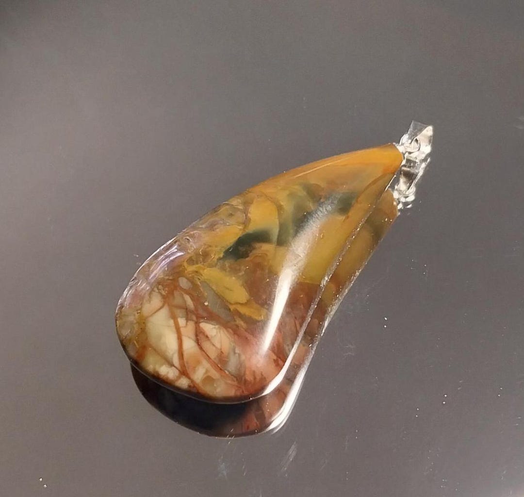 Hand Carved Morrisonite Pendant With Sterling Silver Bail. - Etsy