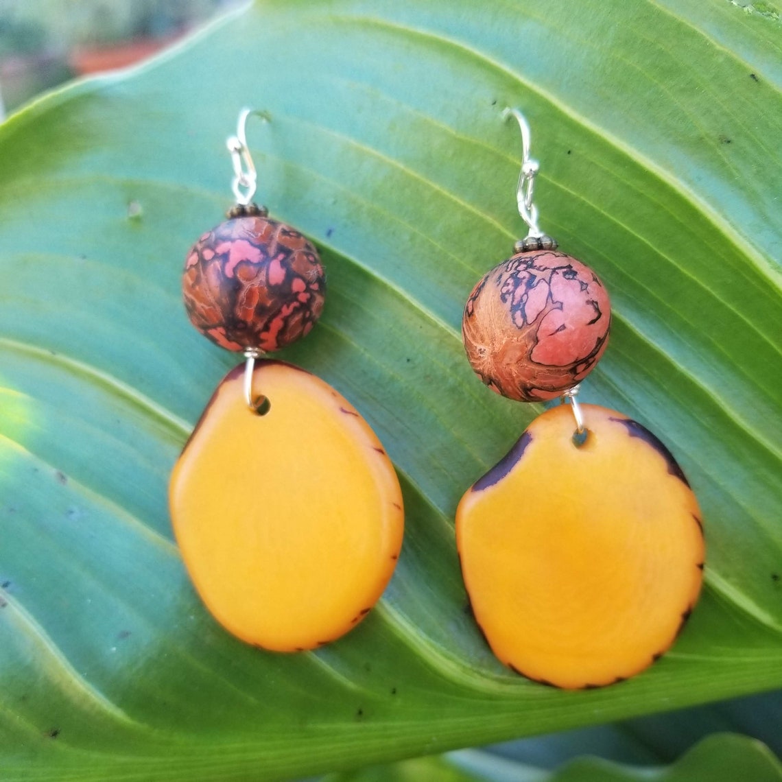 Yellow Tagua Seed Hanging From Coral-colored Round Amazonian Seed - Etsy