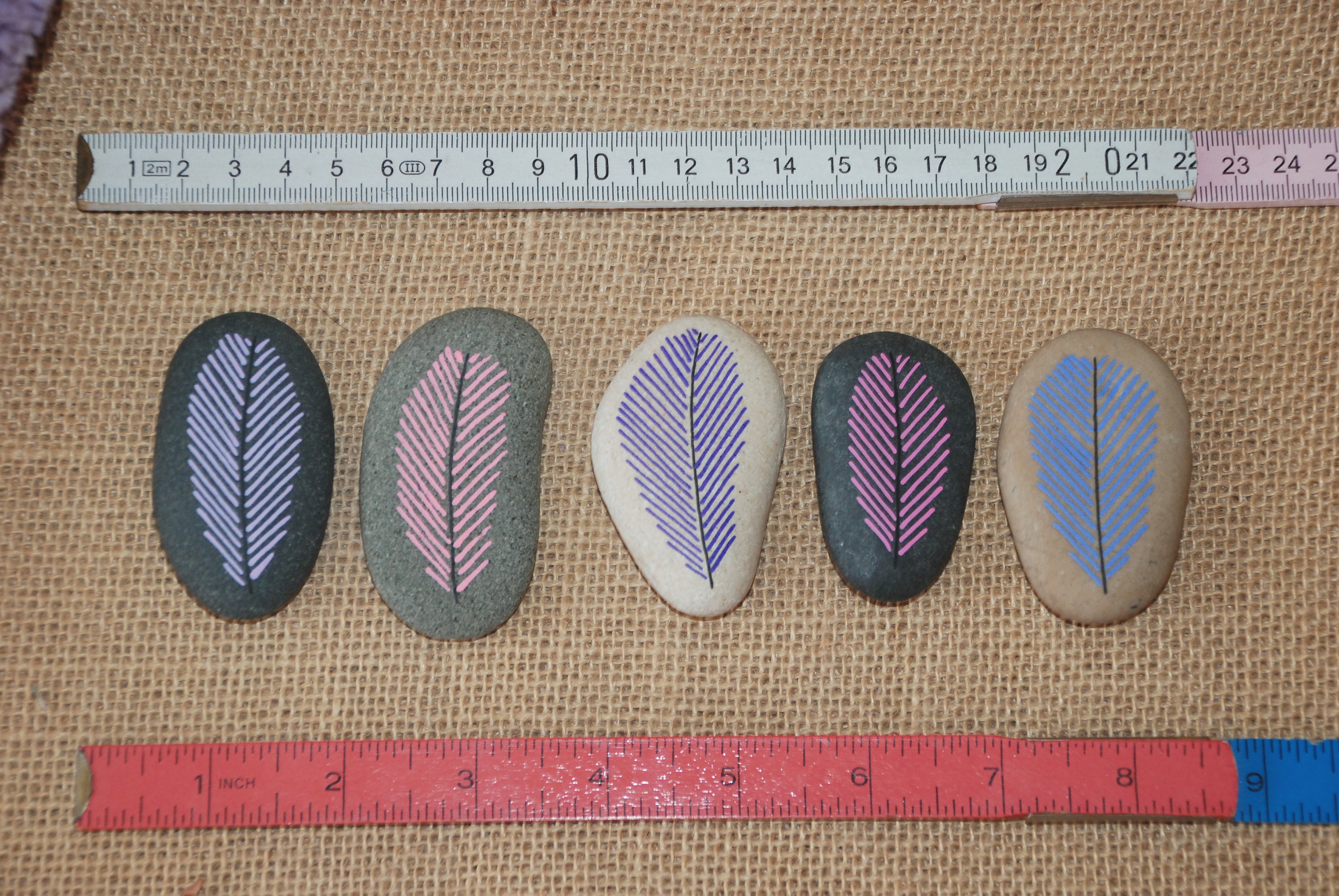 5 Painted Stones Colorful Feathers hand painted rocks | Etsy