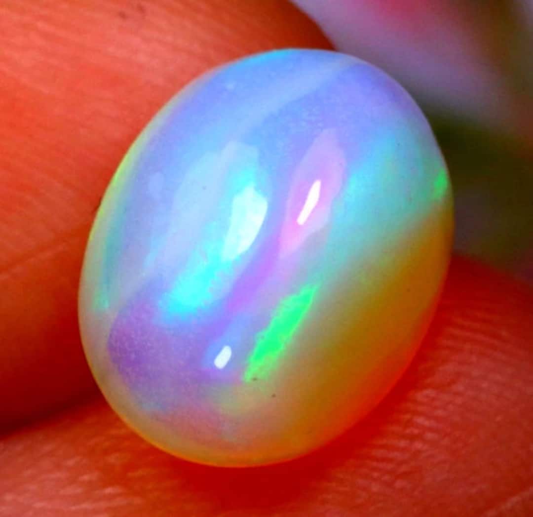 Genuine Mined 2.12ct Natural Ethiopian Welo Opal Cabochon. 10 X 8 X 5.2 Mm. Intense Colouration ...