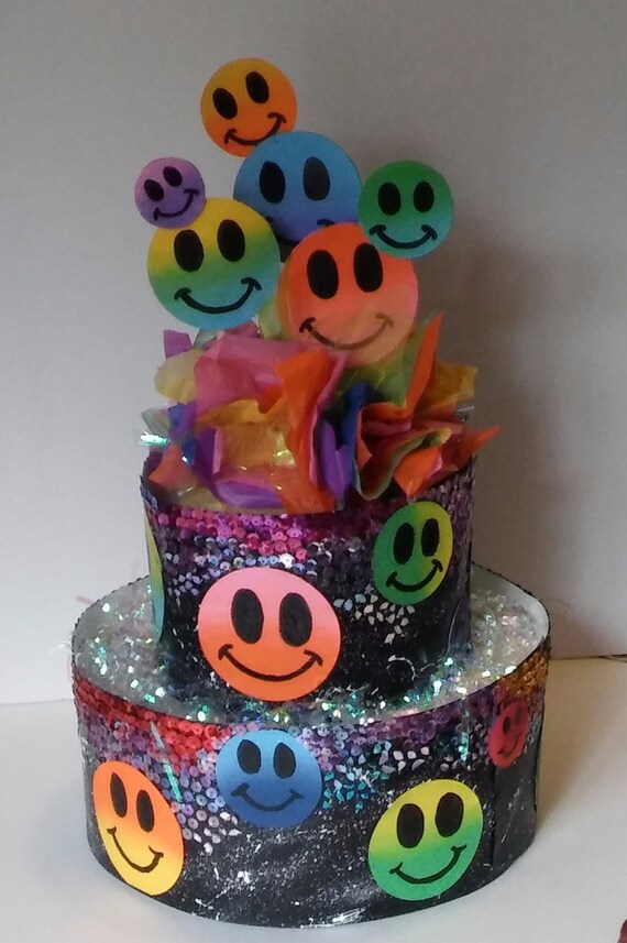Items similar to Two tier smiley face diaper cake on Etsy