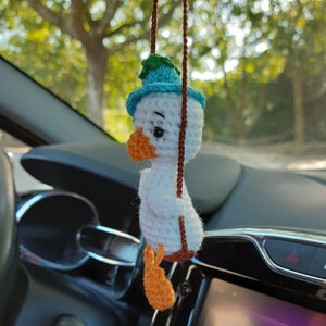 Crochet Swinging White Goose With Blue Bell Flower Hat , Rear View ...