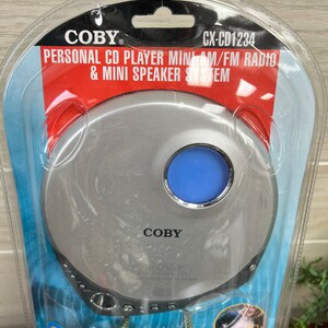 Coby CX-CD1234 Portable Cd Player With Fm/am Radio and Mini Speakers ...