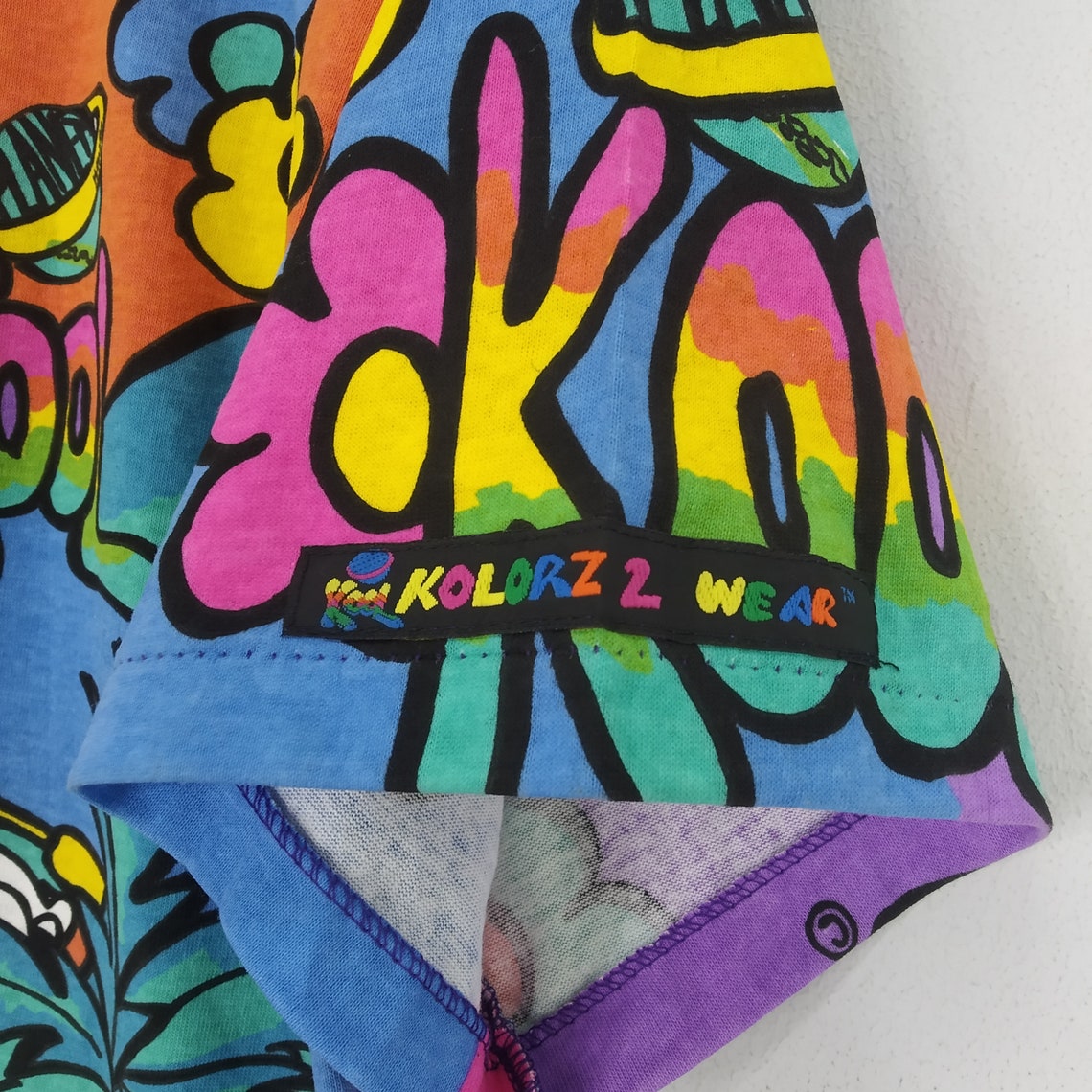 Vintage 90s Kool USA Graphic Artwork Kool Kozmik Overprinted Multicolor Pop Art Ocean Beach T ...