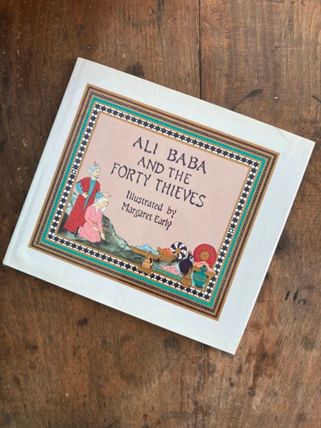 Ali Baba and the Forty Thieves Retold by Walter Mcvitty Illustrated by ...