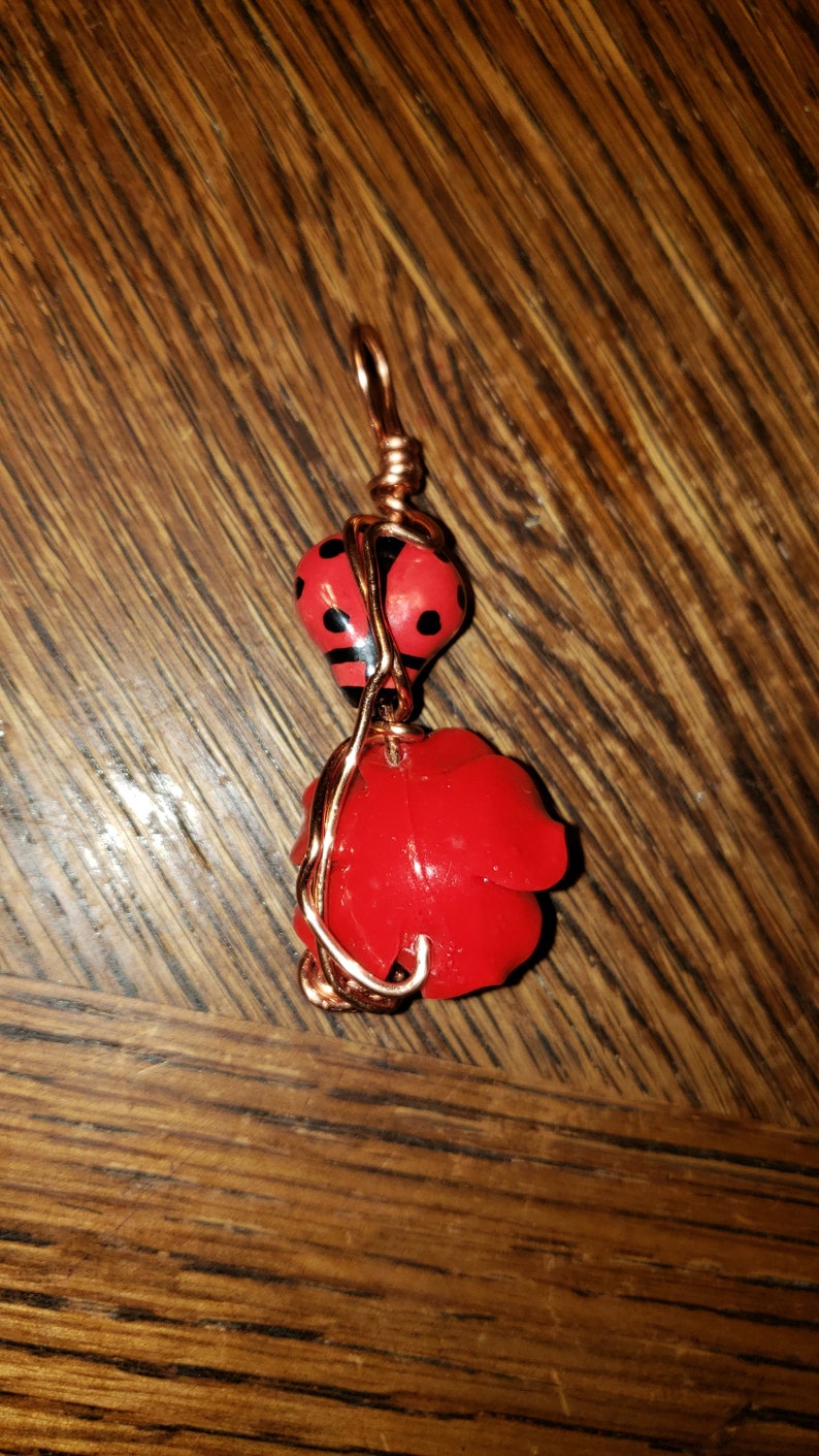 Ladybug Bead Pendant With Rose Embellishment Wire Wrapped With Copper ...