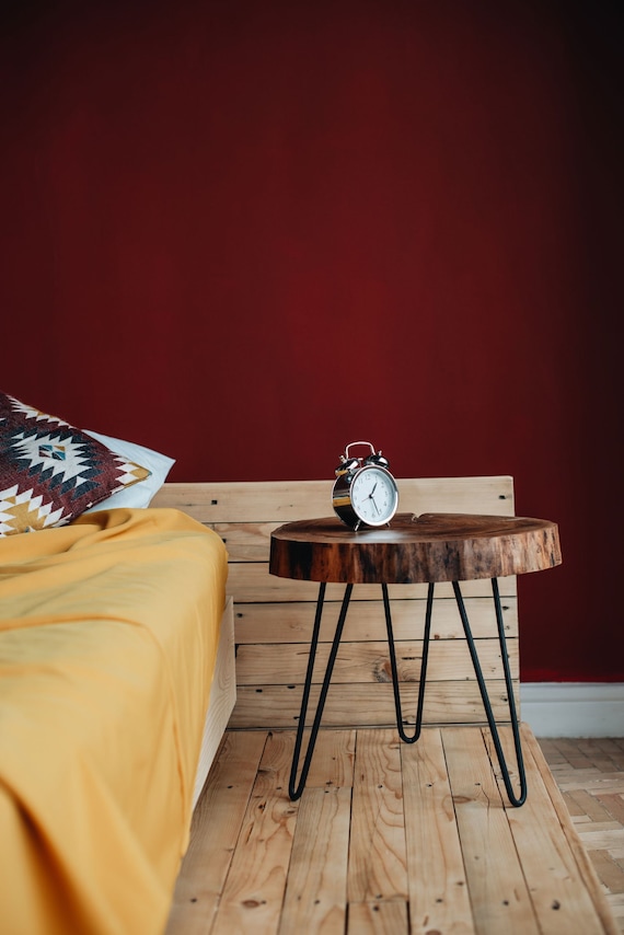 Side stand for bed store