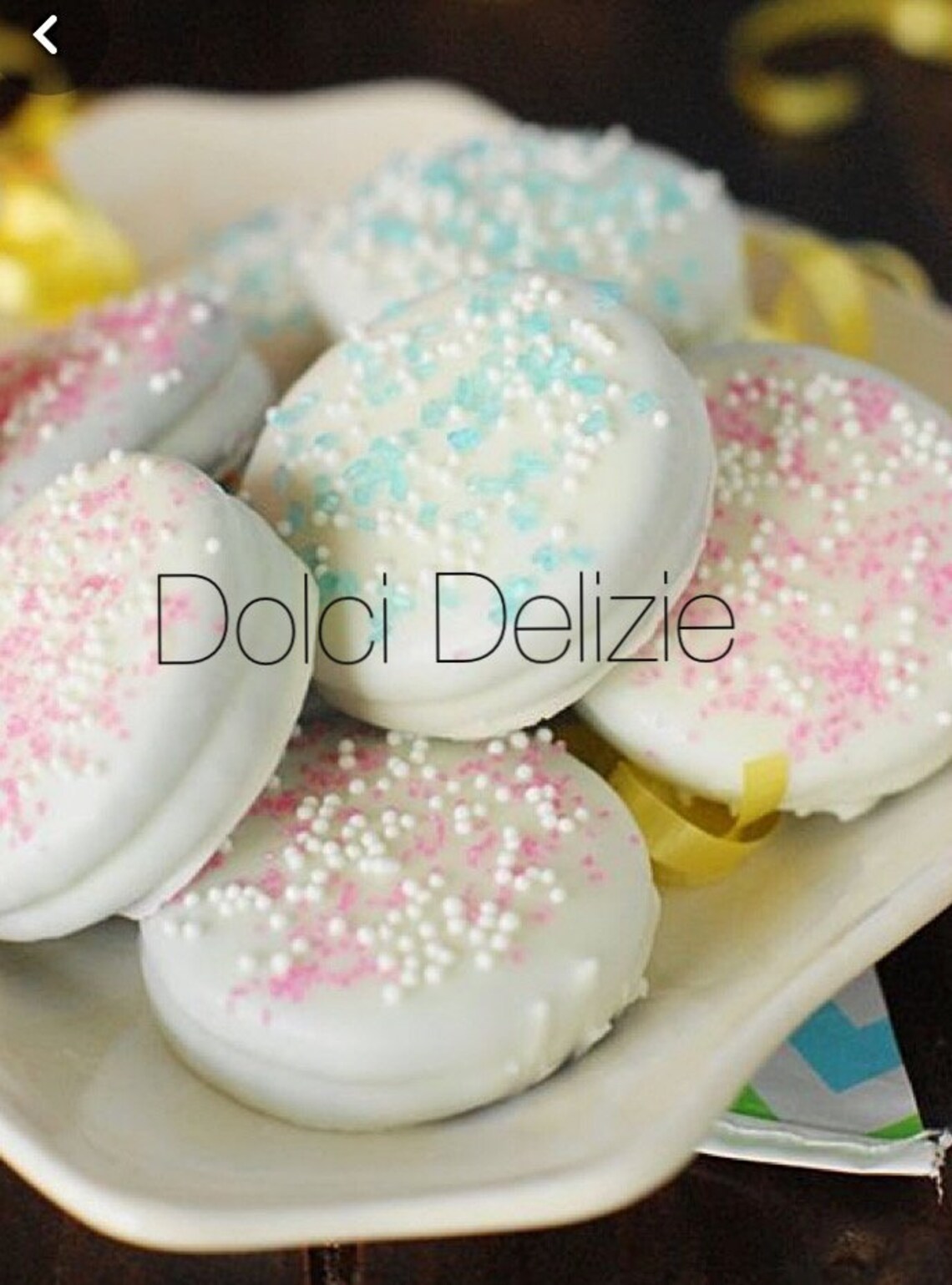 Galletas oreo cubiertas de chocolate rosa azul blanco, mesa de caramelo ...