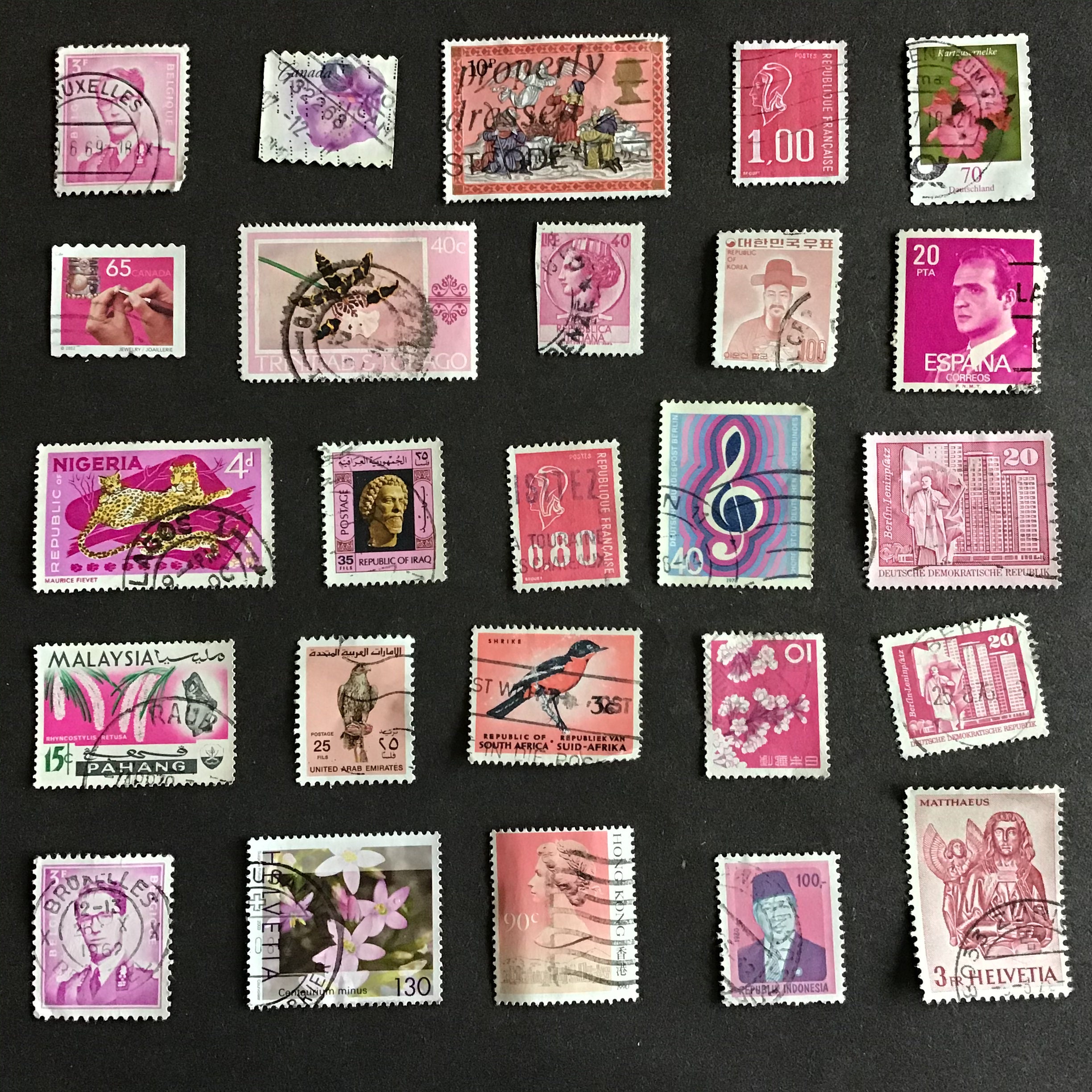 25 pink stamp selection. Used world stamps | Etsy