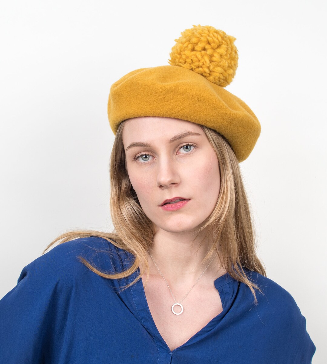 Light, Soft Woollen Basque With a Large Pompon in Bright Golden Yellow ...