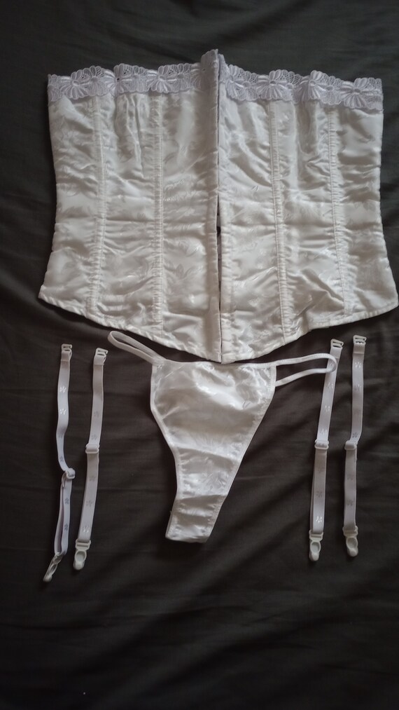 Brand new white Corset set. Label states size M - Gem