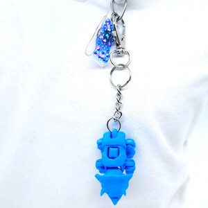 3D Printed Blue Triceratops Badge Reel Charm - Cute, Colorful, and ...