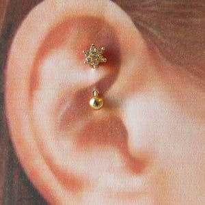 Golden Rook Piercing Spring Multistone Flower Curved Barbell Ring..16g ...