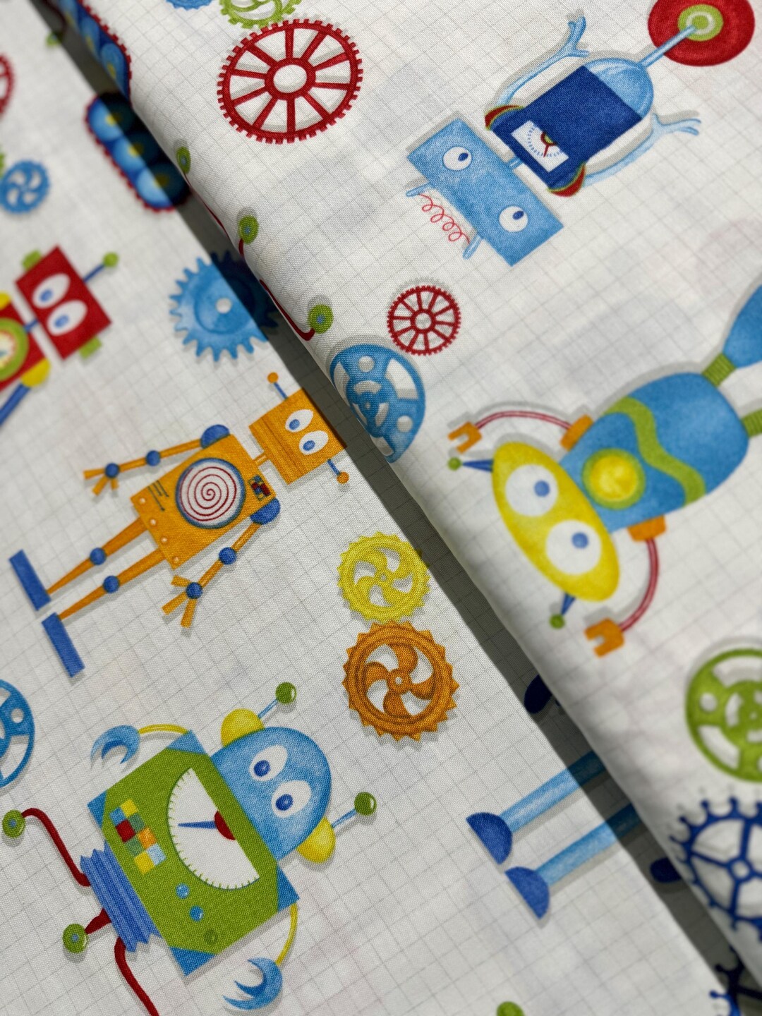 Alpha-bots - Robots Allover White Fabric by Danielle Leone - Cotton ...