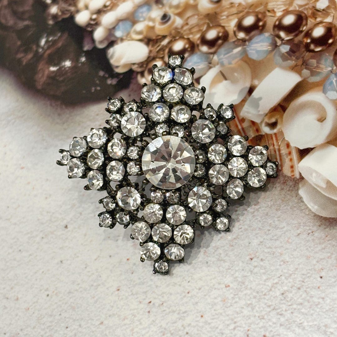 VINTAGE SPHINX Brooch - White or Blue Crystal Rosette - Etsy