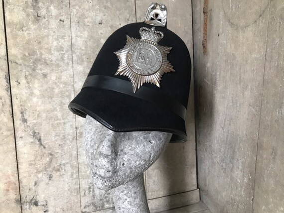 British custodian helmet with Queen Elizabeth emblem - Gem