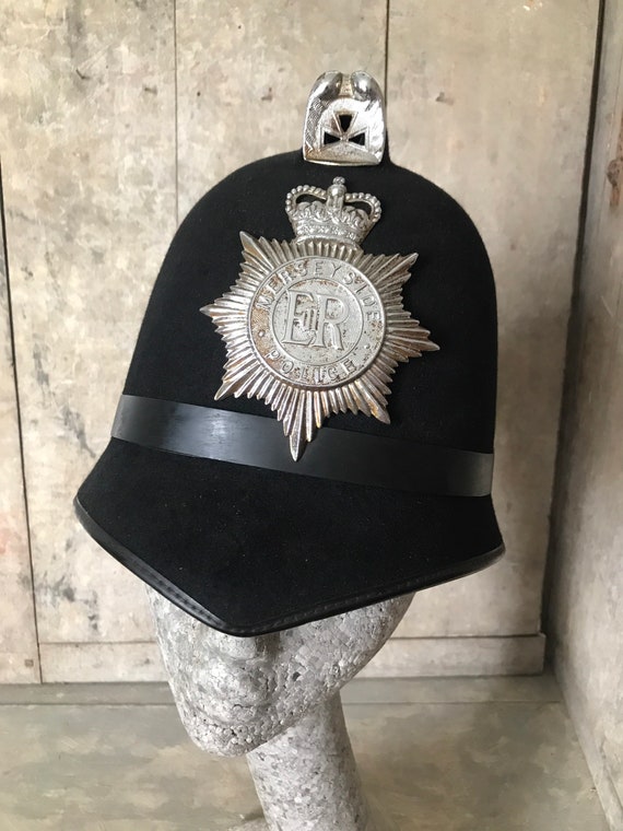 British custodian helmet with Queen Elizabeth emblem - Gem