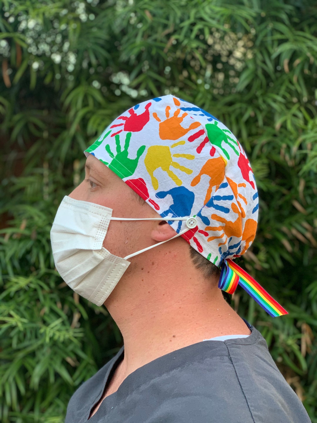 Rainbow Handprints Against White Background Scrub Cap With Buttons ...