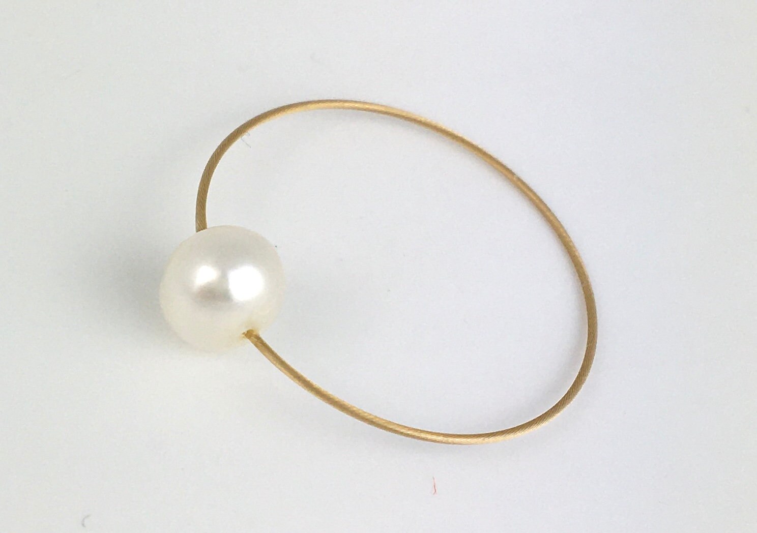 Freshwater pearl ring. Classic pearls on a wire of gold. | Etsy