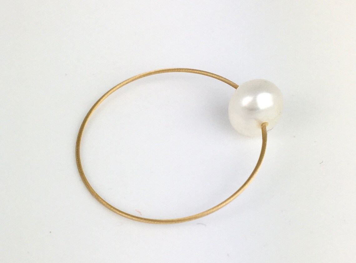Freshwater pearl ring. Classic pearls on a wire of gold. | Etsy