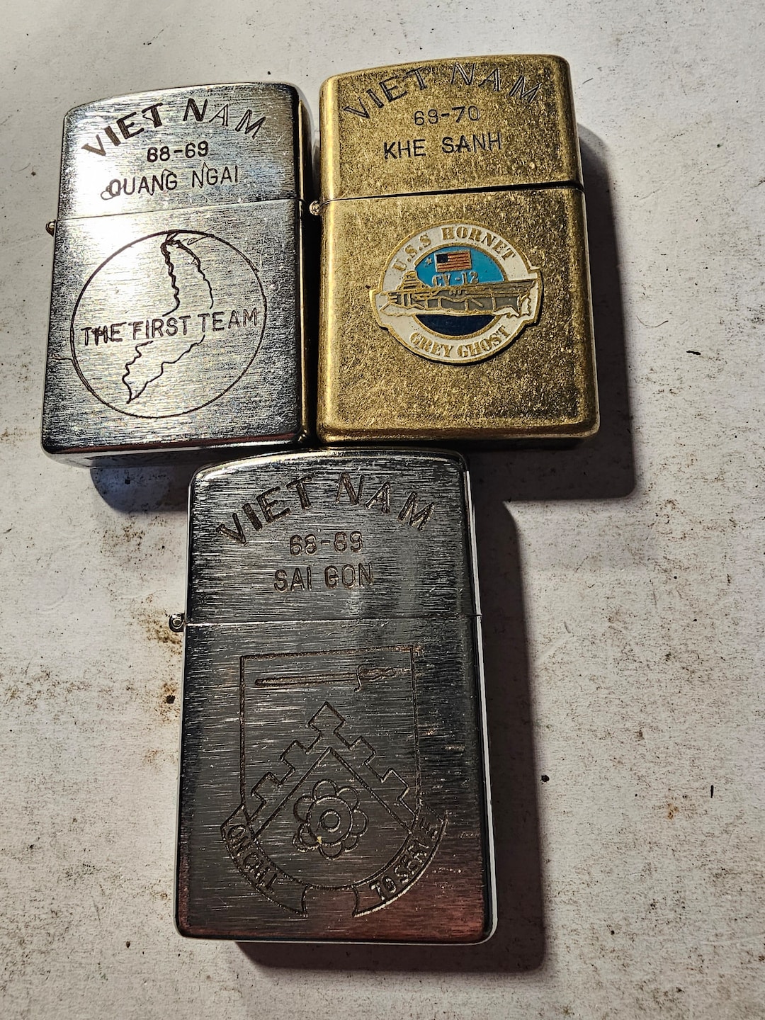 Three Vietnam War Zippo Lighters the First Team 1969, U.S.S Hornet Grey ...