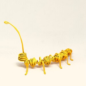 Yellow Worm. Wire Caterpillar. Centipede Sculpture. Wire Figure. Yellow ...