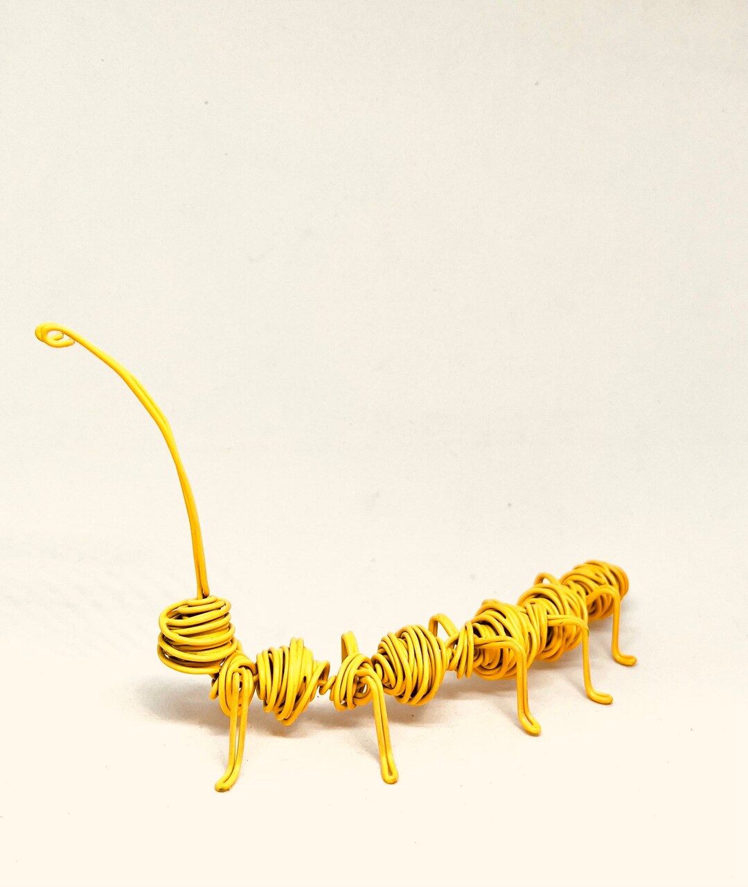 Yellow Worm. Wire Caterpillar. Centipede Sculpture. Wire Figure. Yellow ...