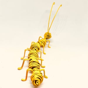 Yellow Worm. Wire Caterpillar. Centipede Sculpture. Wire Figure. Yellow ...
