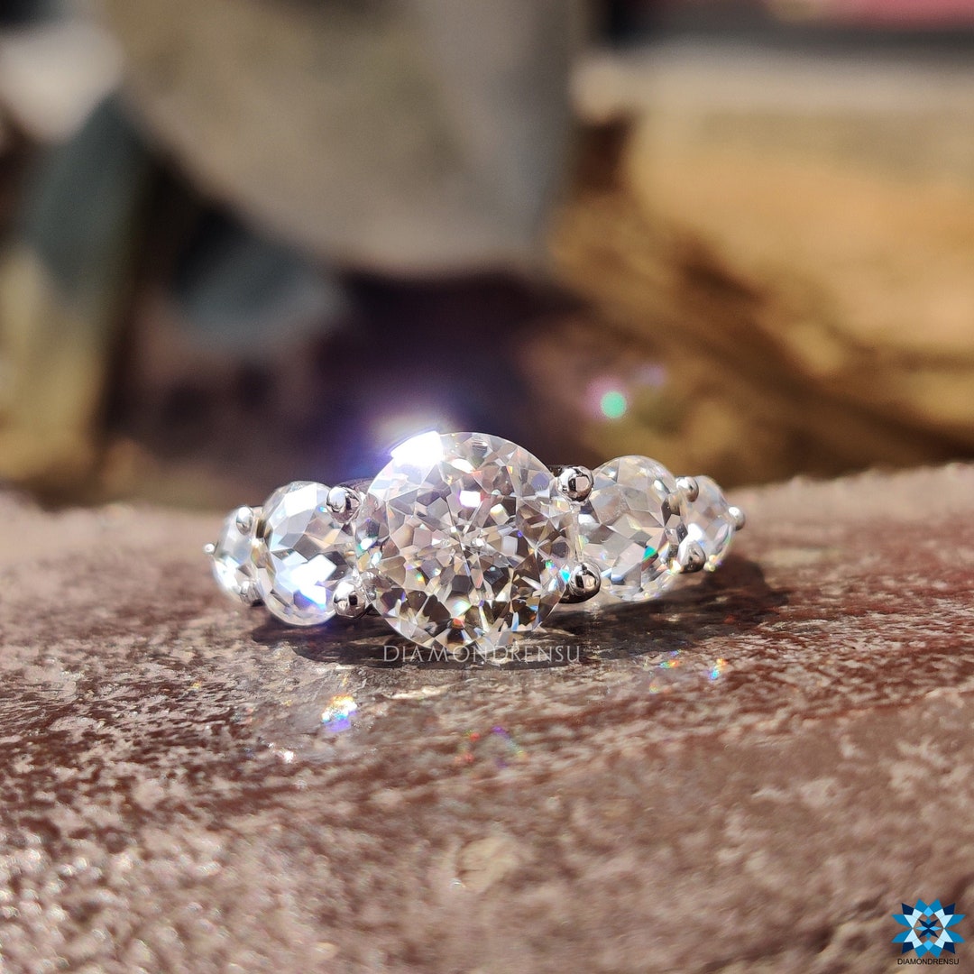 Jubilee Cut Moissanite 5 Stone Engagement Ring in Trellis Setting, Side ...