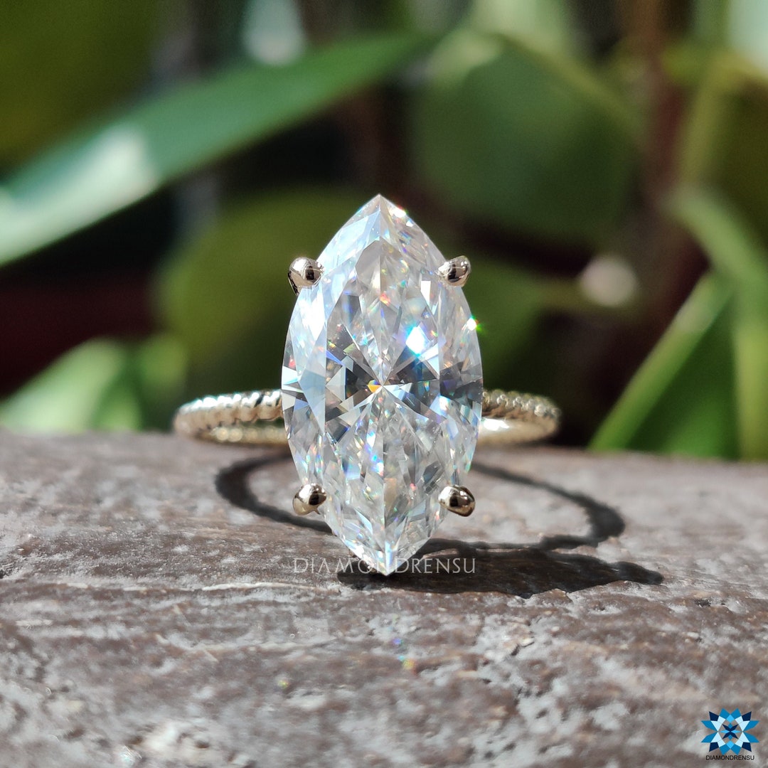 Anillo de compromiso clásico de moissanita de talla marquesa casi ...