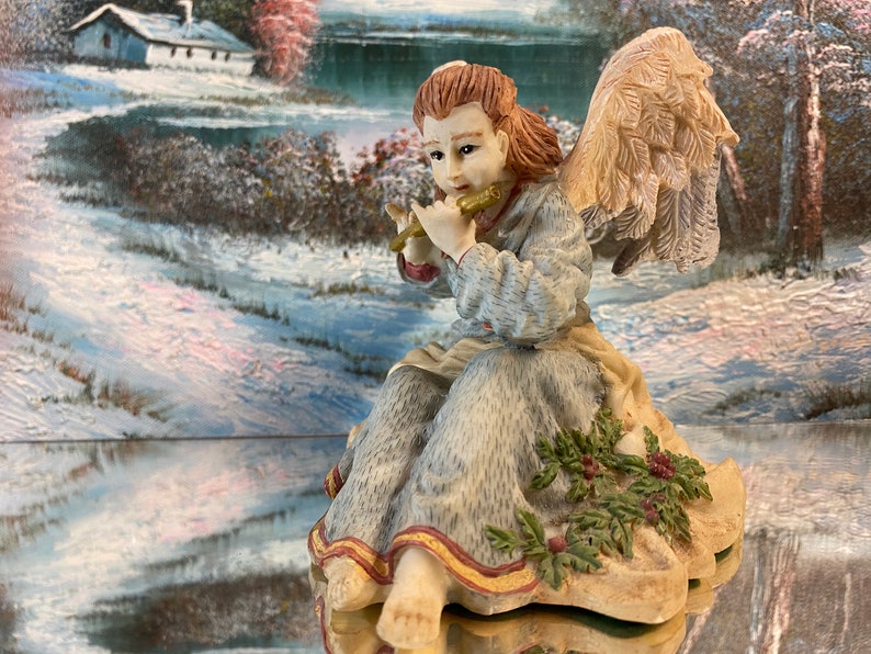 Angel Figurine Playing Flute Cast Resin by International Resourcing ...