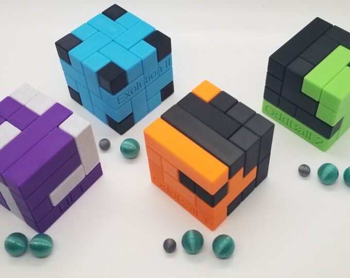 Interlocking Cube Puzzles With Marbles Inside - Lift, Exolution II ...