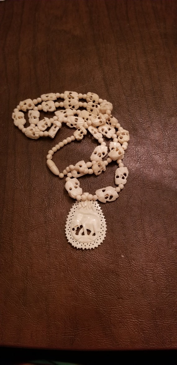 carved bone elephant - Gem